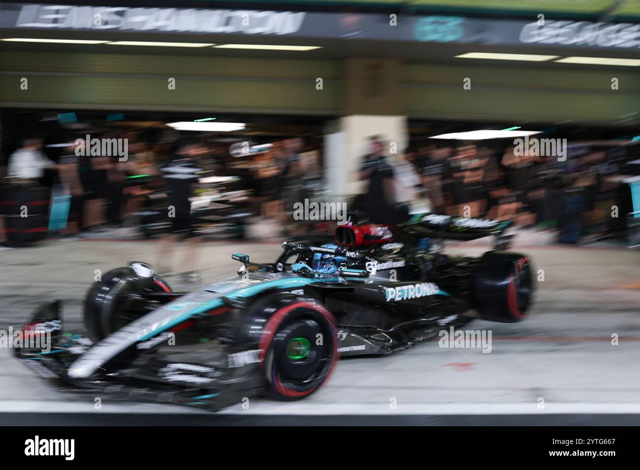Mercedes driver George Russell of Britain leaves the pit during the ...