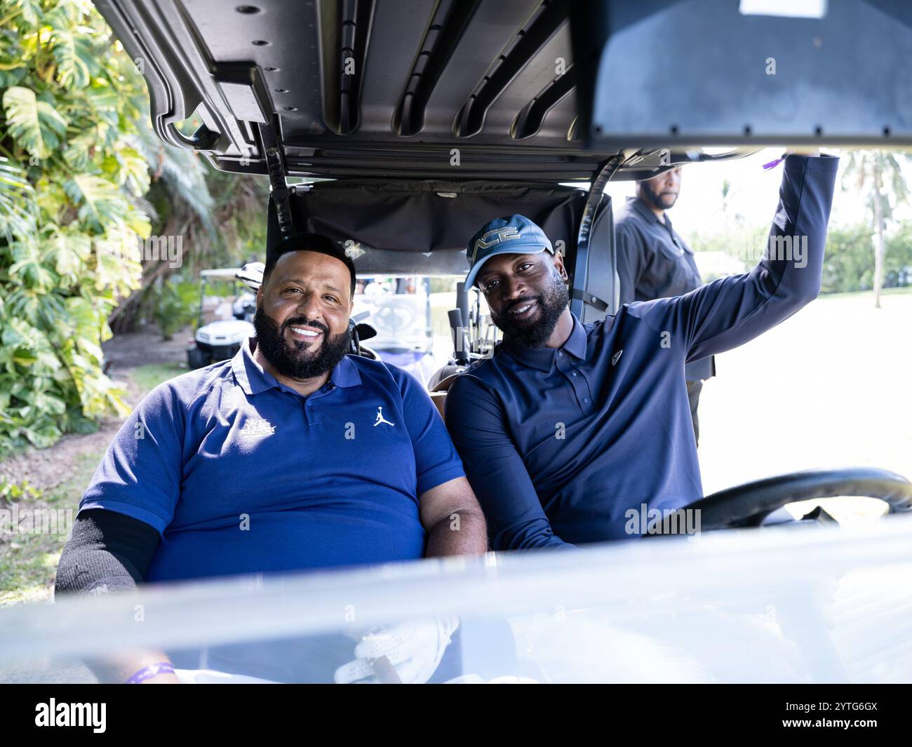 DJ Khaled and Dwyane Wade moving to the next hole during the 2nd Annual ...