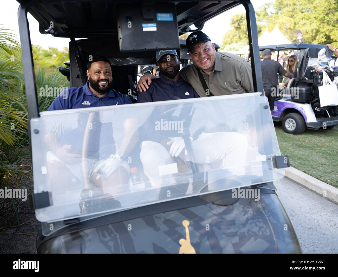 DJ Khaled, Dwyane Wade, and Shawn Pecas catching up during the 2nd ...