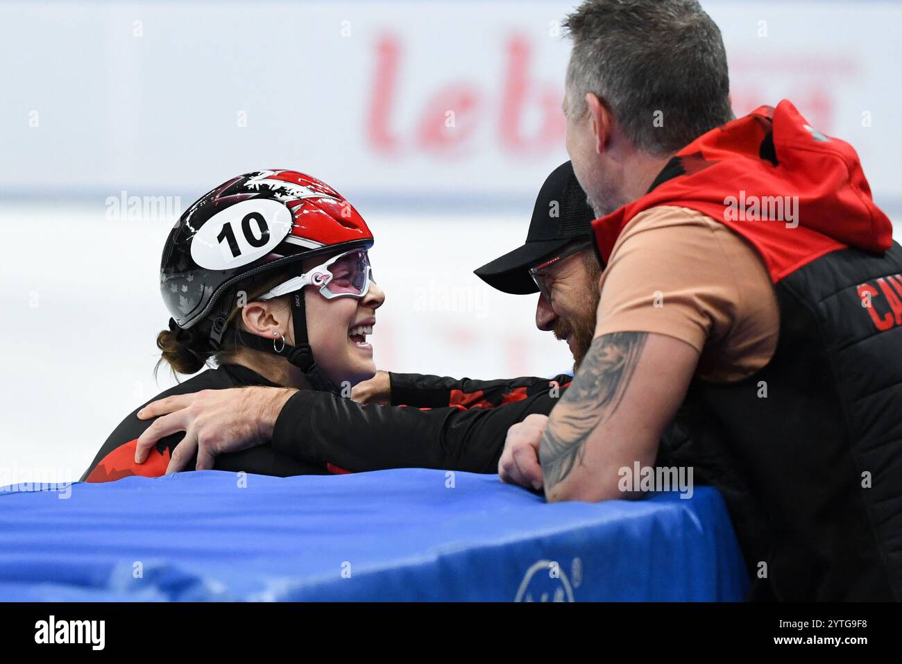 Beijing, China. 7th Dec, 2024. Danae Blais (L) of Canada celebrates ...
