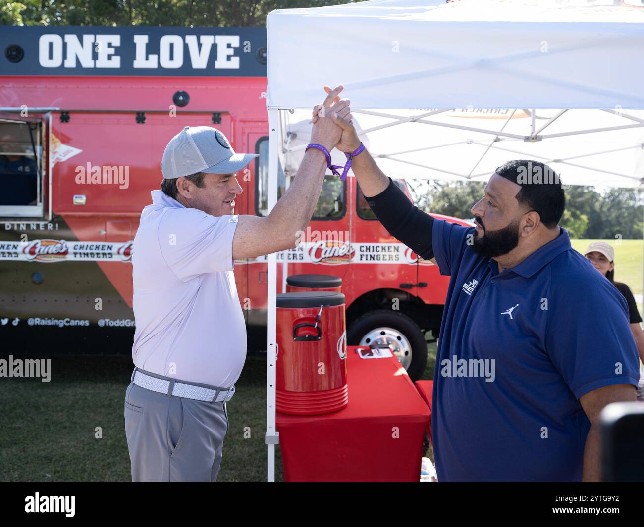 Miami Beach, USA. 05th Dec, 2024. odd Graves high-fives DJ Khaled ...