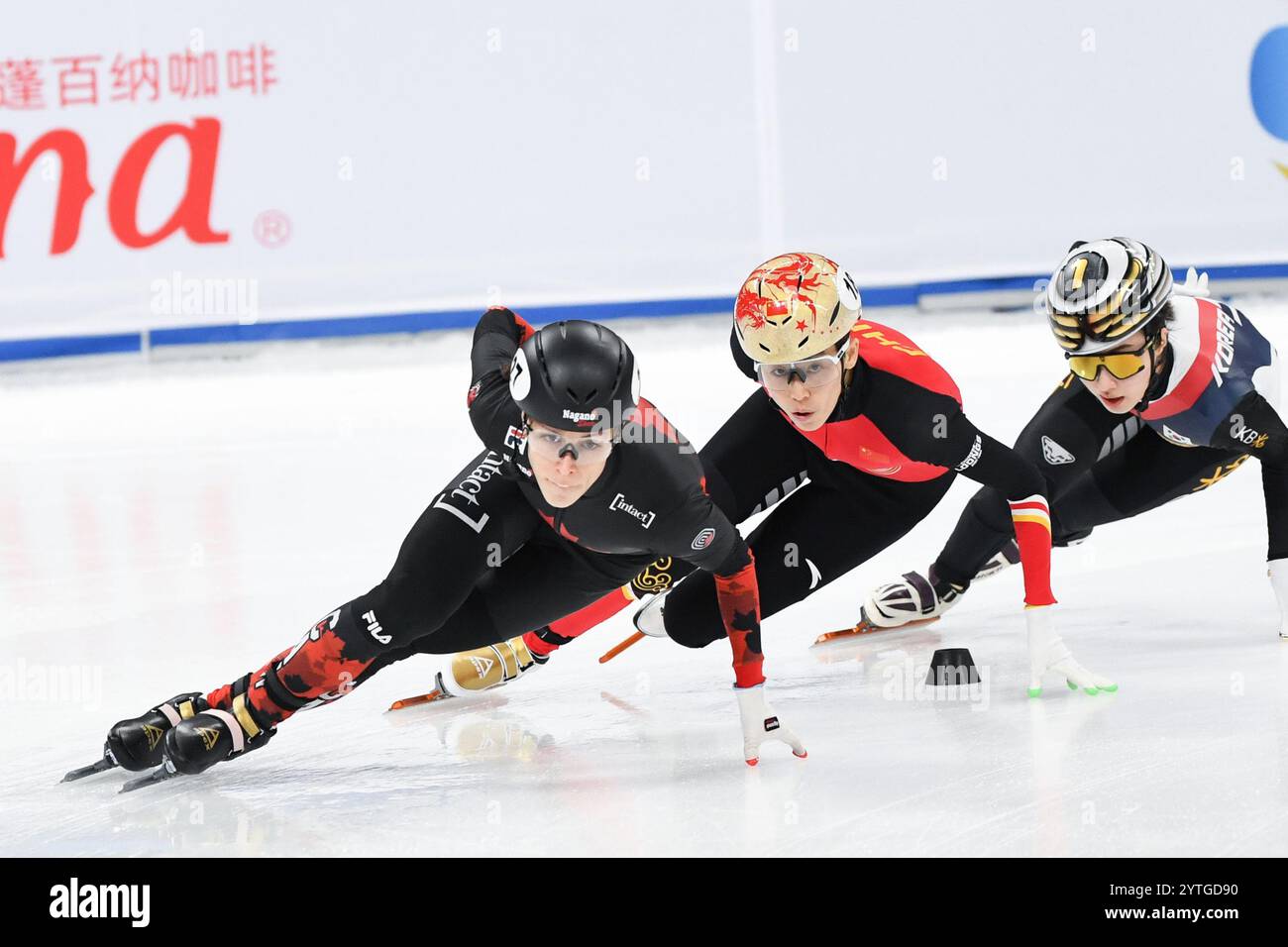 Beijing, China. 7th Dec, 2024. Florence Brunelle (L) of Canada, Fan ...