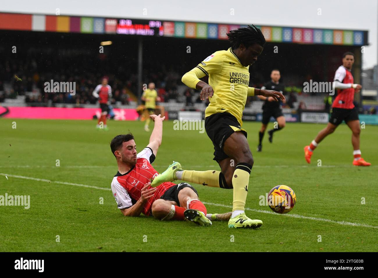 Lincoln, England. 7th Dec 2024. Tyreece Campbell and Sean Roughan ...