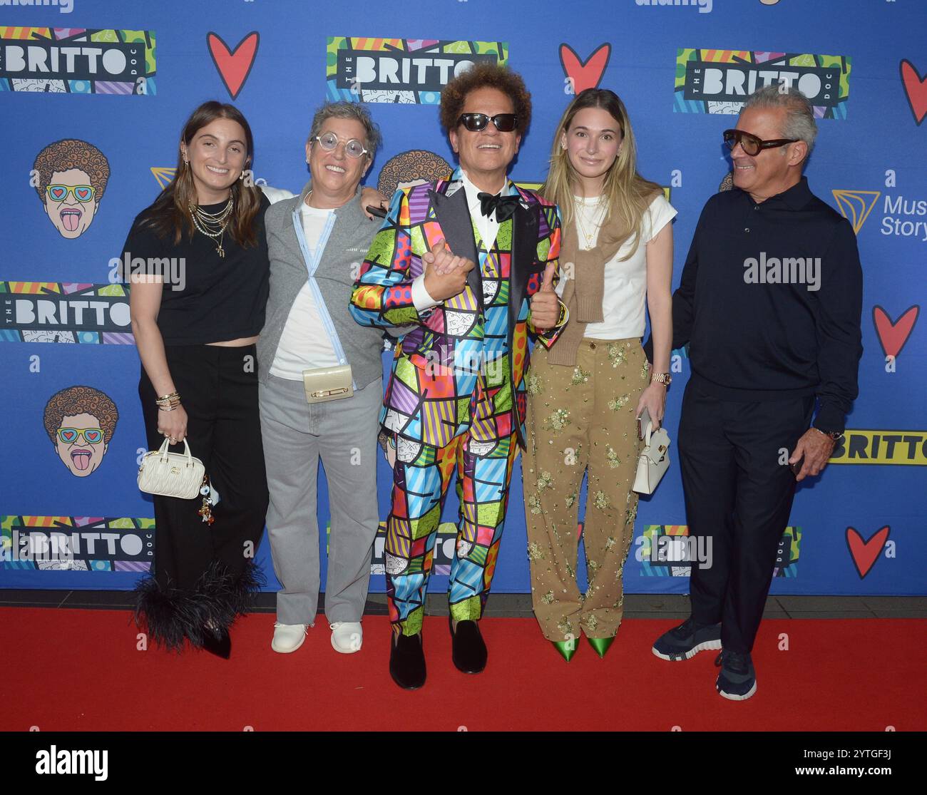 MIAMI BEACH, FLORIDA - DECEMBER 05: Artist Romero Britto (C) and Guests ...