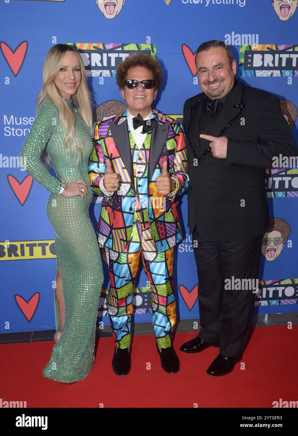 MIAMI BEACH, FLORIDA - DECEMBER 05: Artist Romero Britto (C) and Guests ...