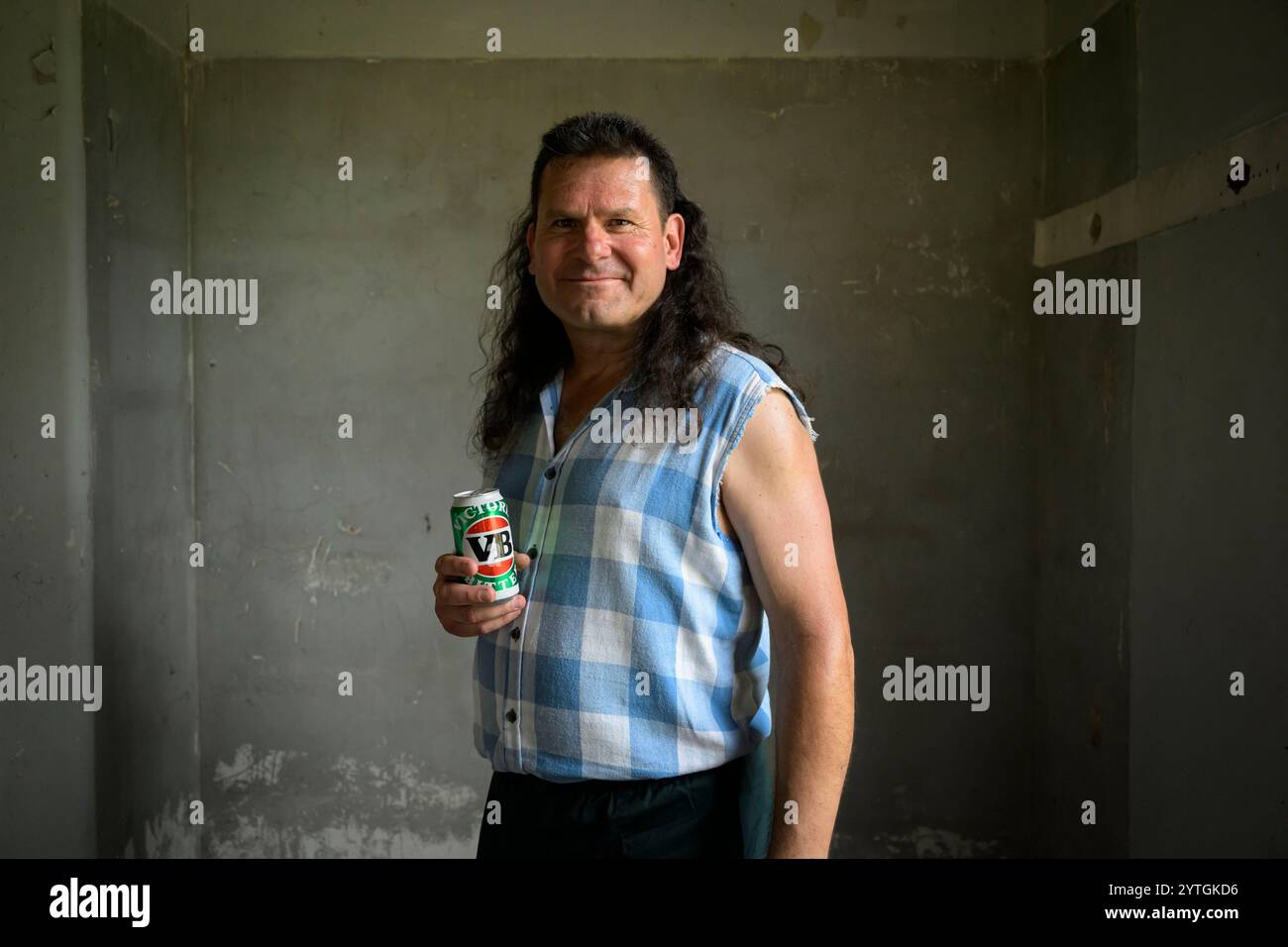 Contestant seen holding a bottle of VB beer, one of the best selling ...