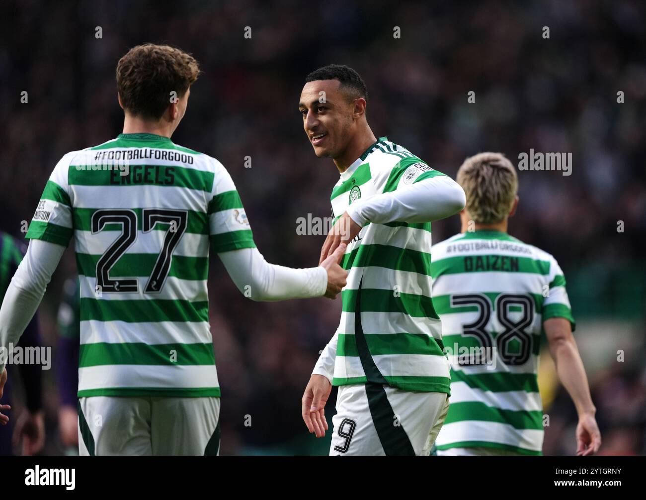 Celtic's Arne Engels (left) celebrates scoring their side's first goal ...