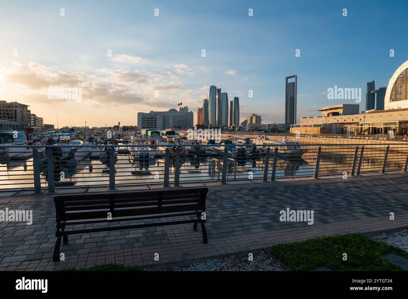 Mesmerizing view of Abu Dhabi modern skyline mirrored in the tranquil ...