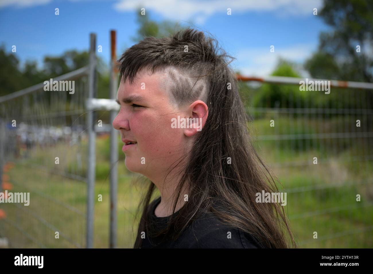Contestant seen posing for photos during the Mullet Fest Grand Final ...
