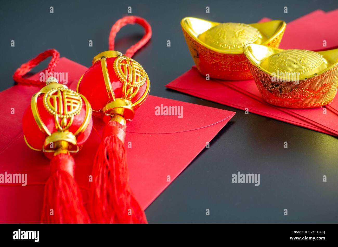 Chinese New Year decoration with golden ingots and Chinese New Year ...