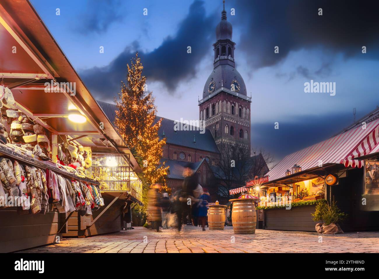 Dome square Christmas market with a towering lit tree and festive ...