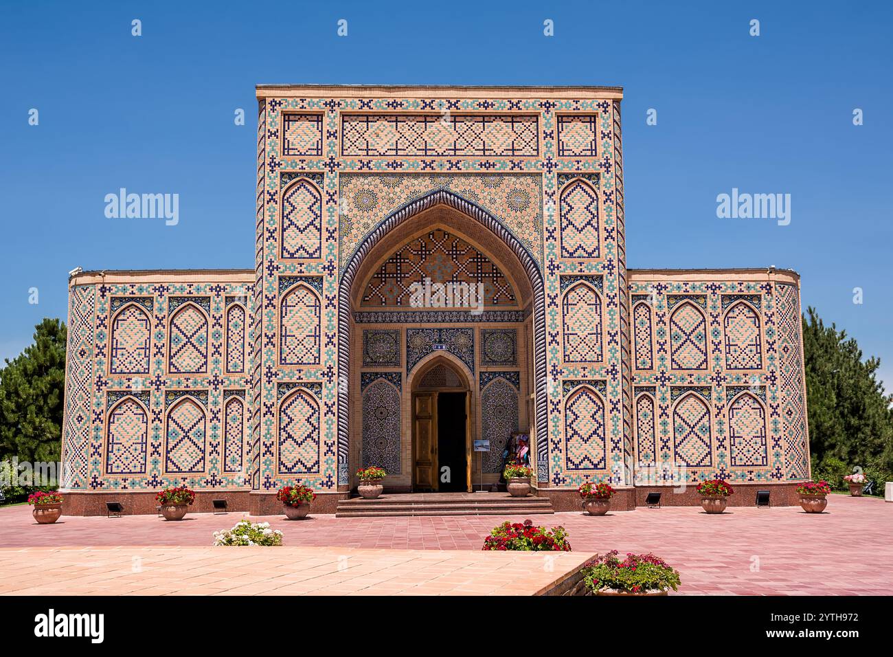 Facade of the palace with mosaics that houses the museum of Mirzo ...