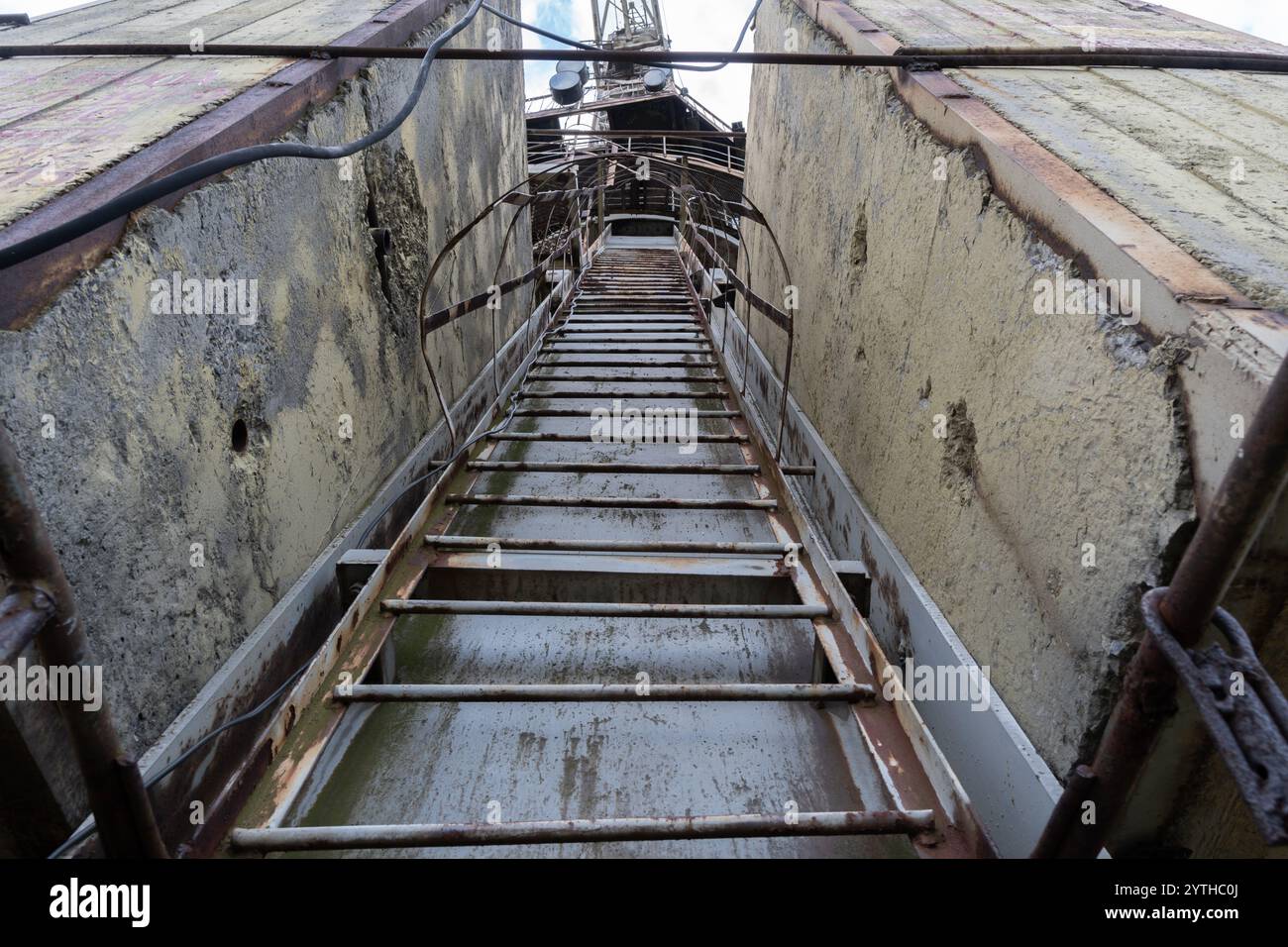 Rusty Industrial Ladder Leading Skyward Stock Photo - Alamy