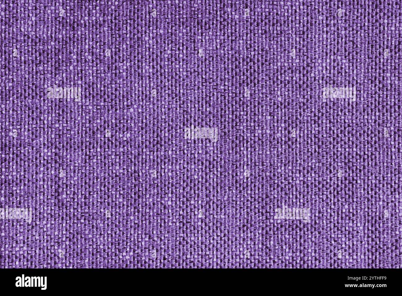 Upholstery purple colored jacquard fabric coarse weave texture close up ...