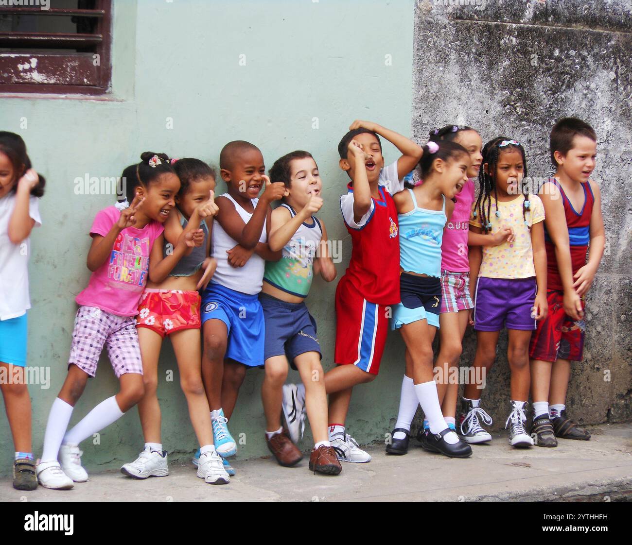 A group of Cuban Kids laughing at the street Stock Photo - Alamy