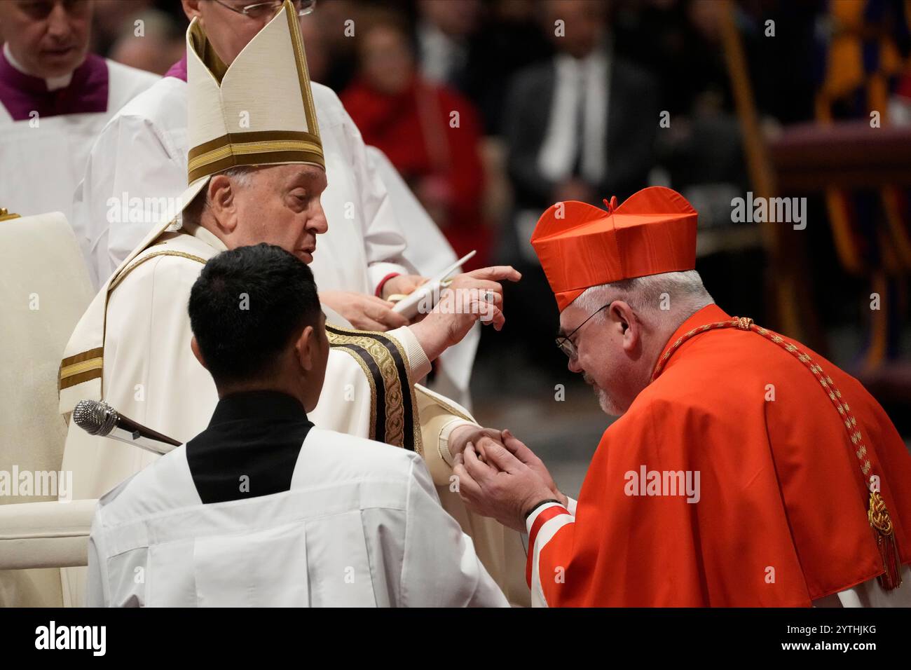 Fabio Baggio, Archbishop of Urusi, Tunisia, right, receives from Pope ...