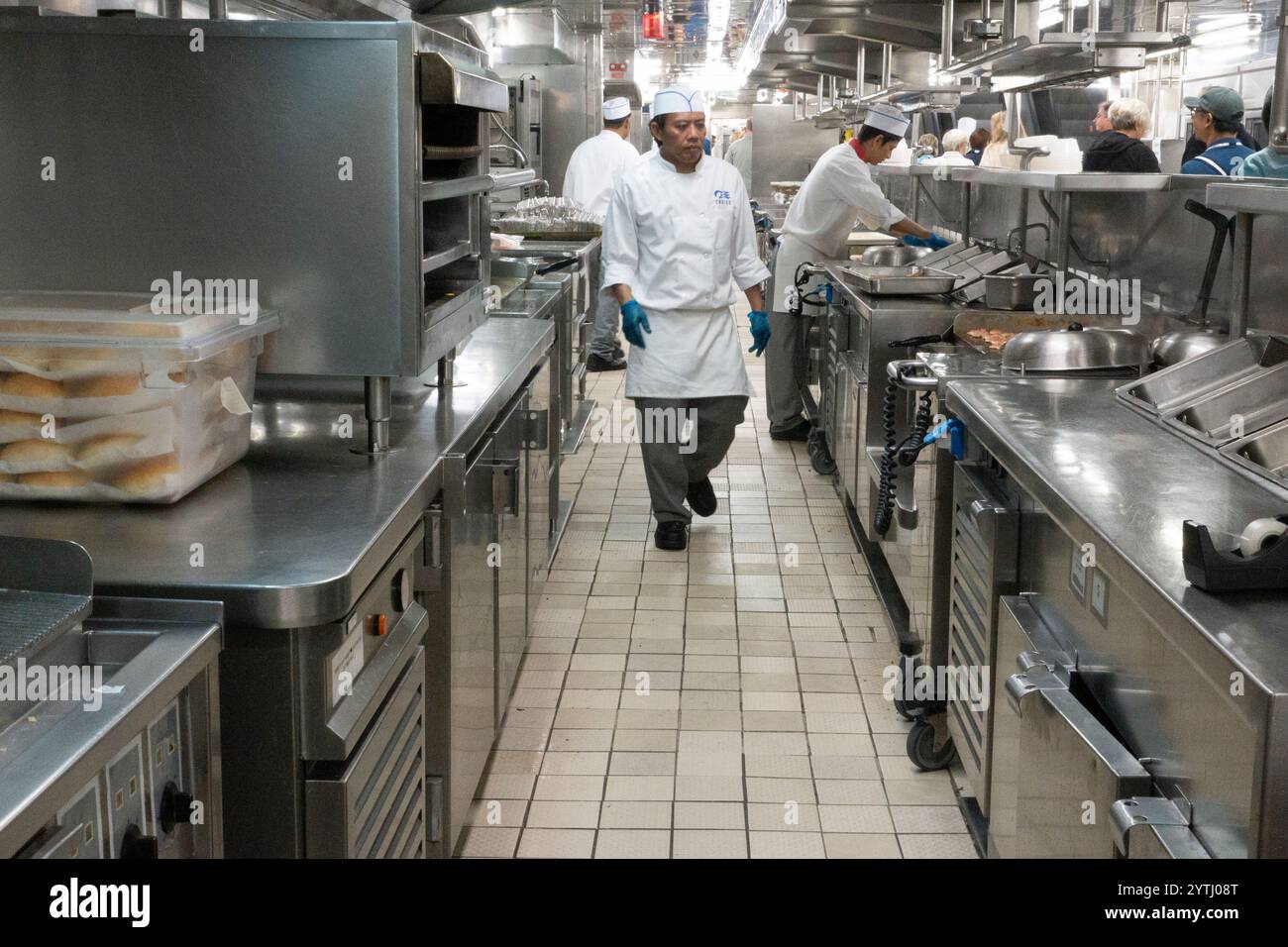 Adriatic Sea - Oct 24, 2024 Cooks in the galley of the Island Princess ...