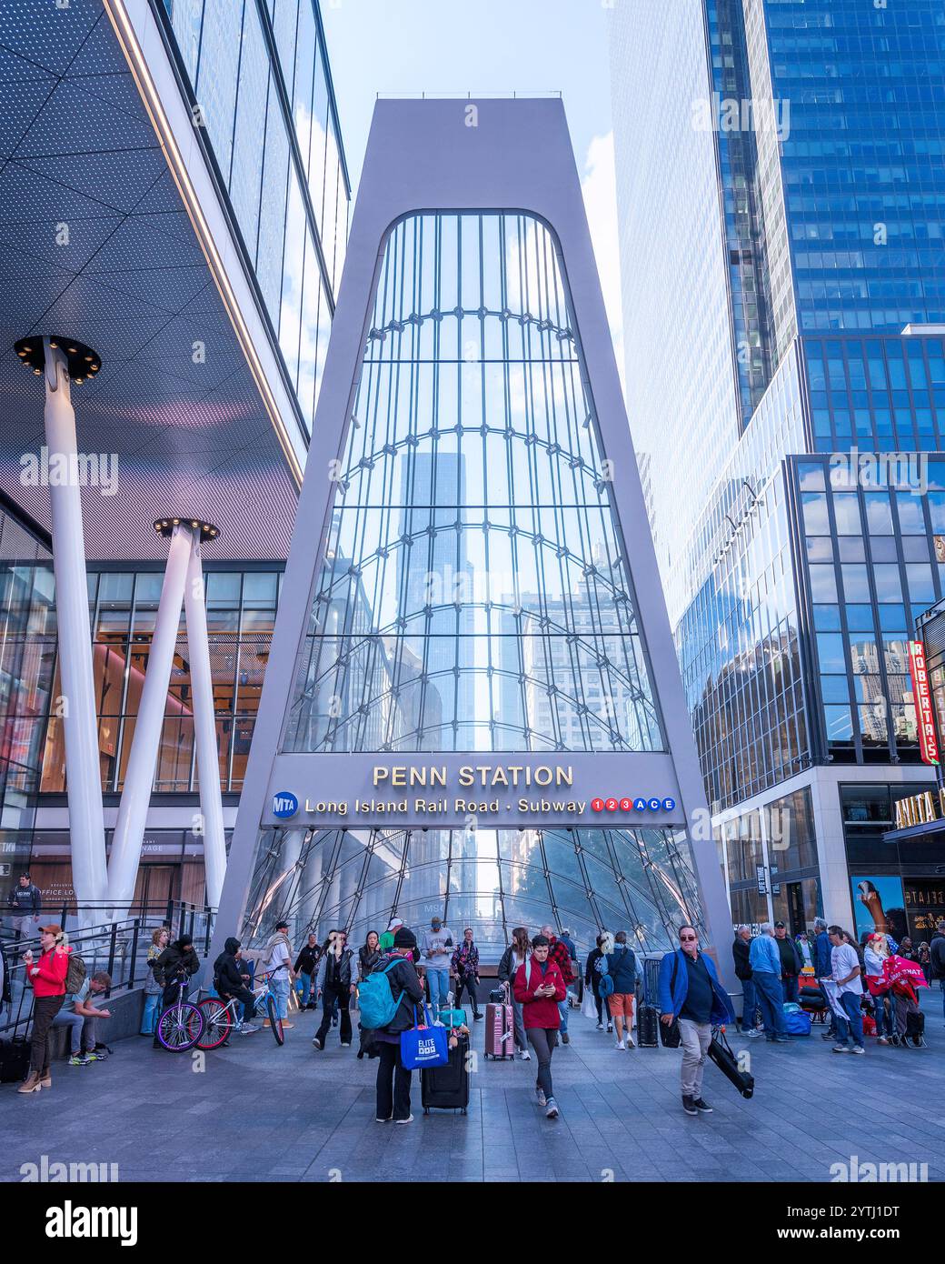 New York, New York, USA – October 27, 2024: Commuters enter and exit at ...