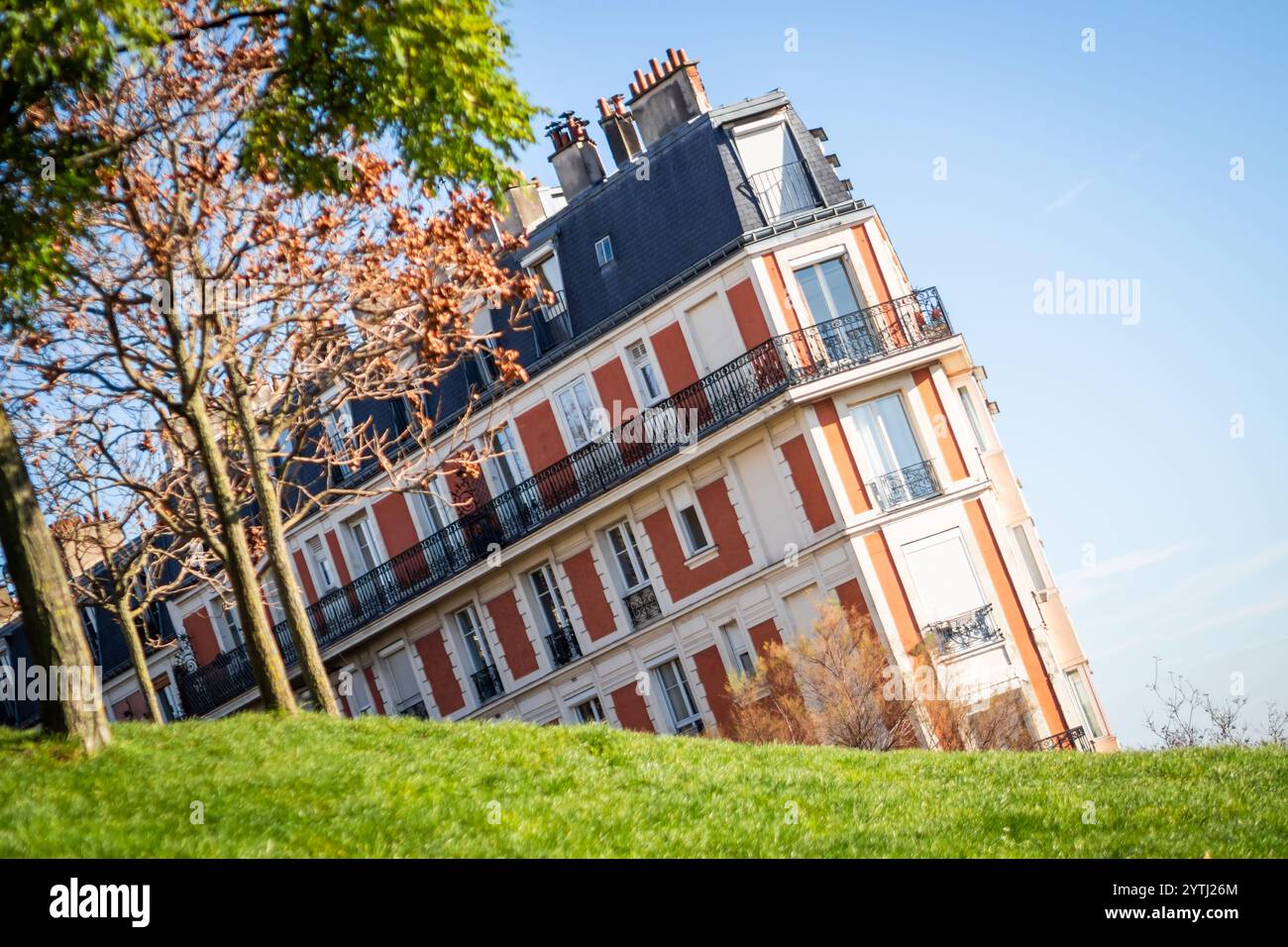 Leaning building in Montmartre at the foot of the Sacre-Coeur in Paris ...