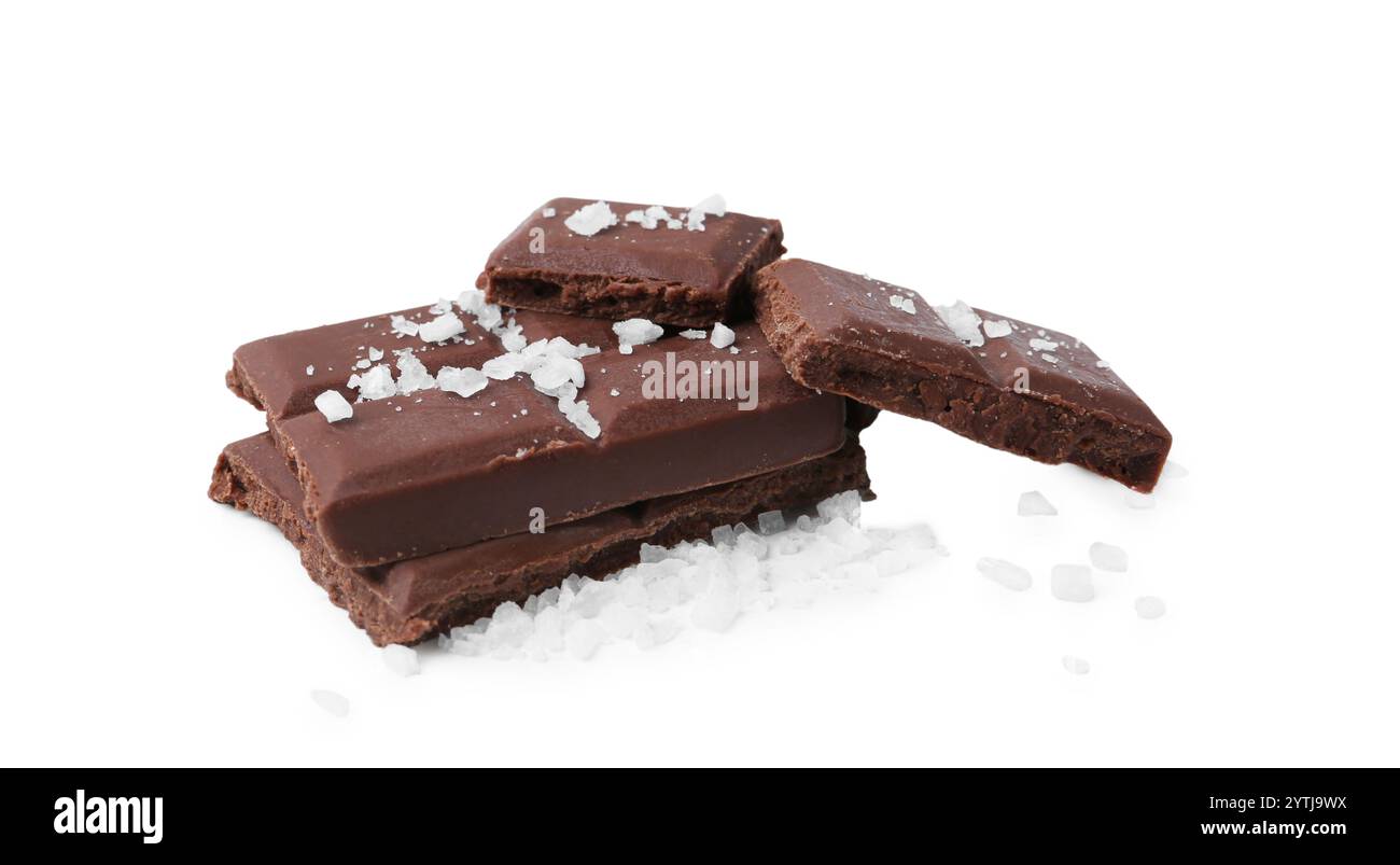 Pieces of chocolate with salt isolated on white Stock Photo - Alamy