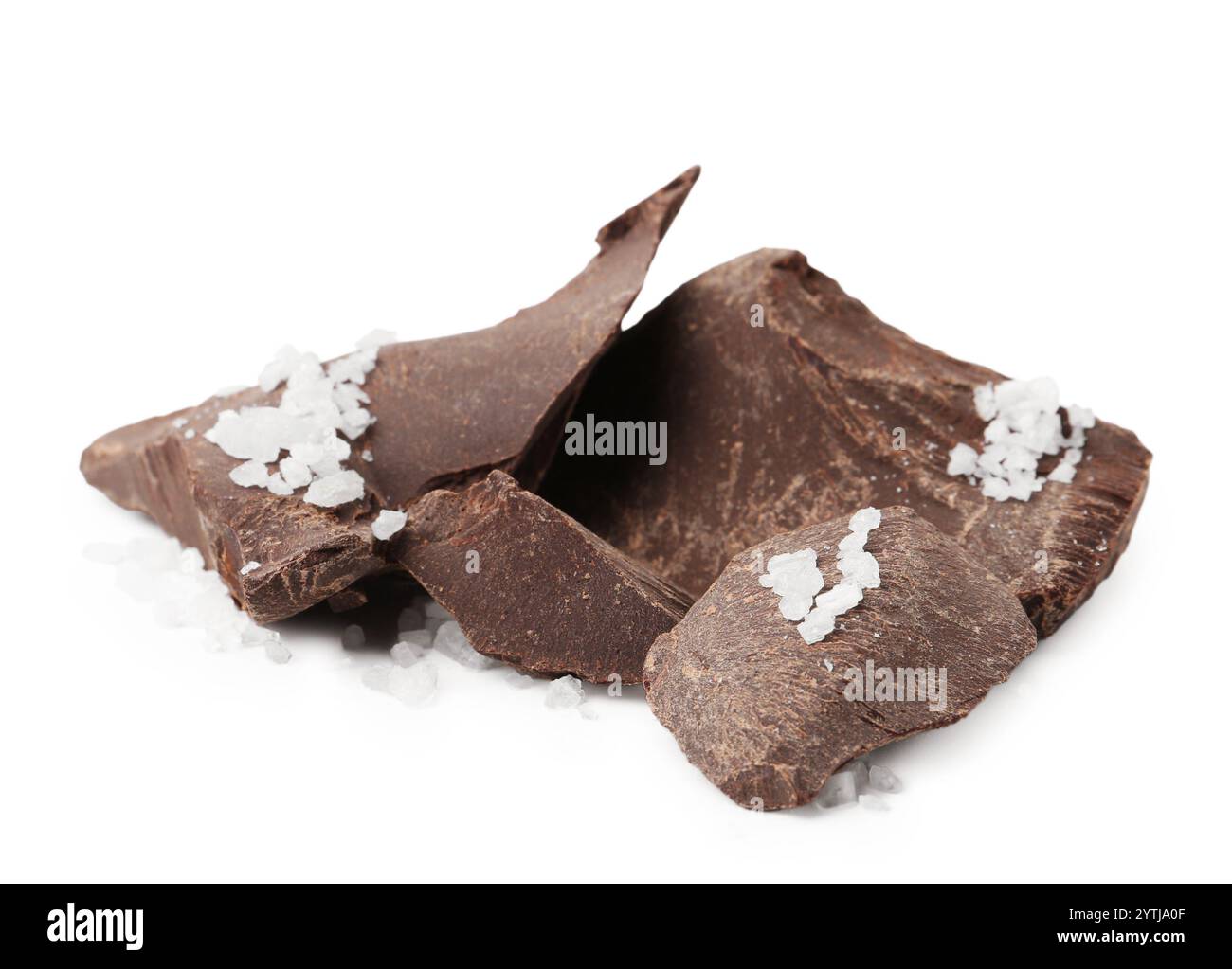 Pieces of chocolate with salt isolated on white Stock Photo - Alamy