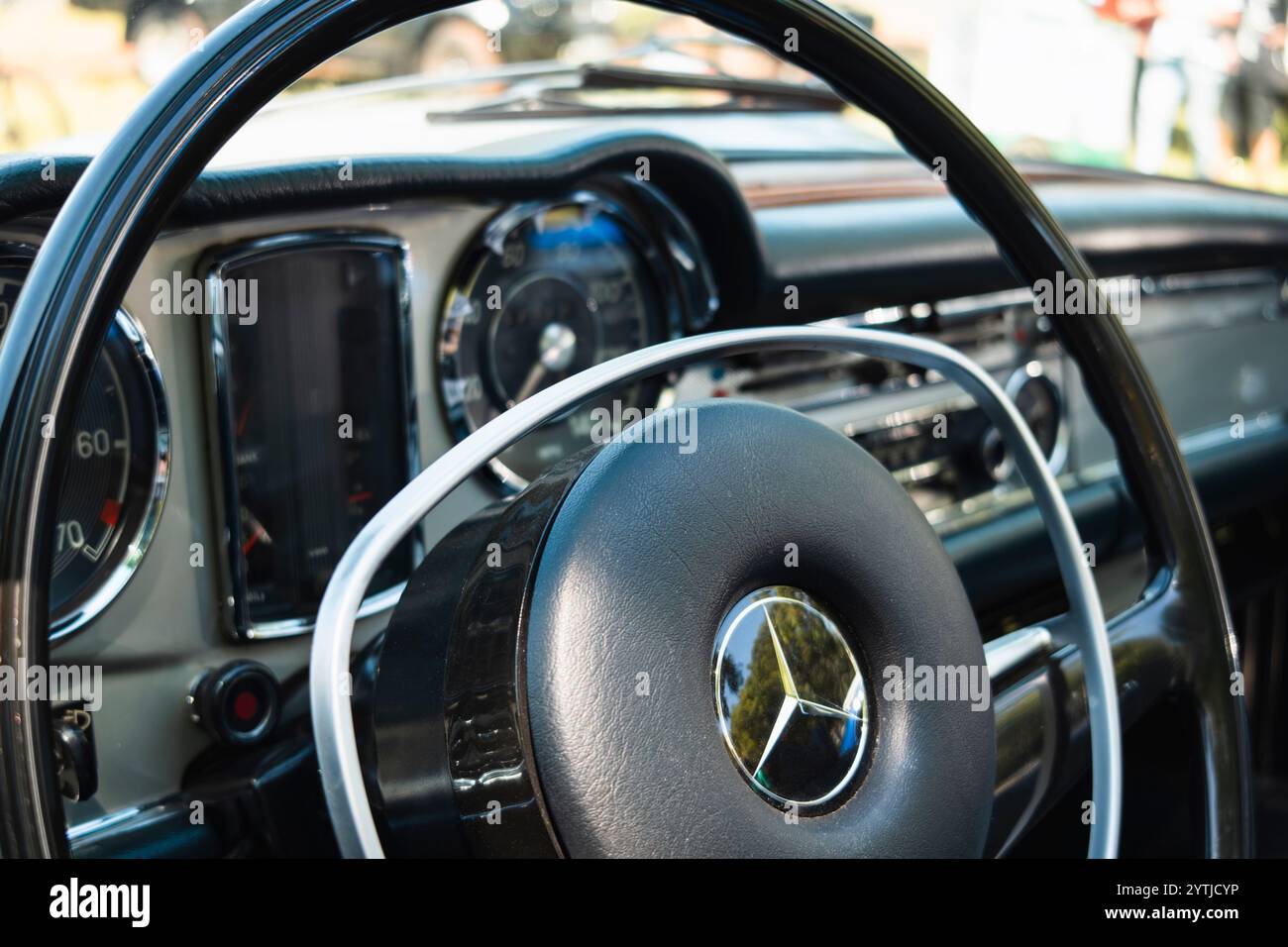 Dashboard of a Mercedes-Benz car, highlighting the steering wheel with ...