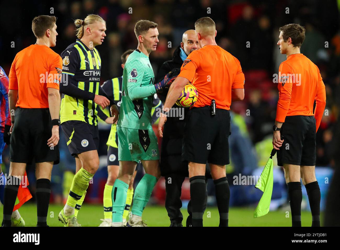 Pep Guardiola of Manchester City speaks to Referee Robert Jones after ...