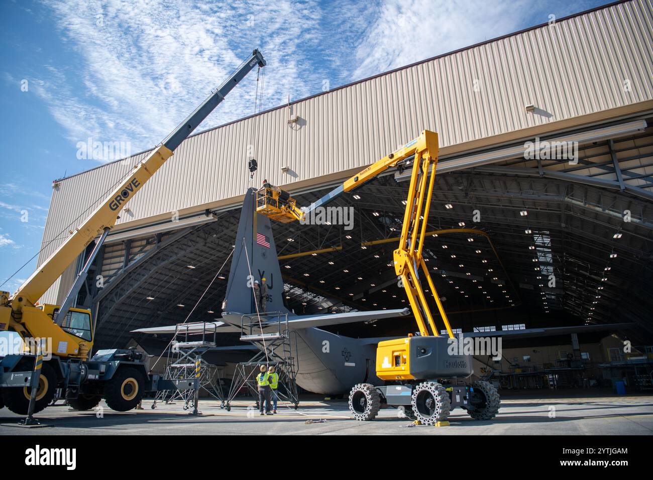 U.S. Air Force maintenance personnel, alongside Japanese national ...