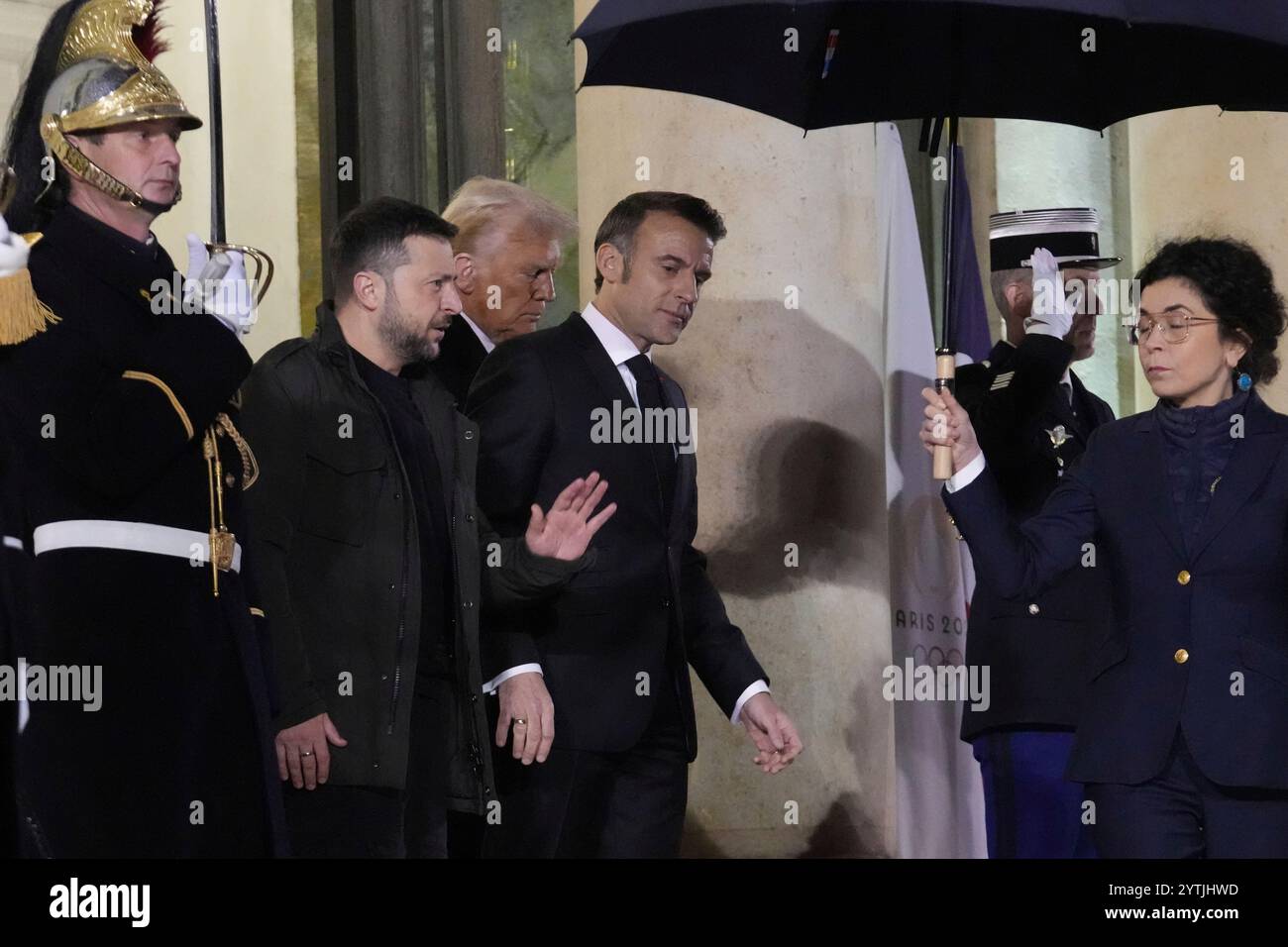 French President Emmanuel Macron, right, President-elect Donald Trump ...