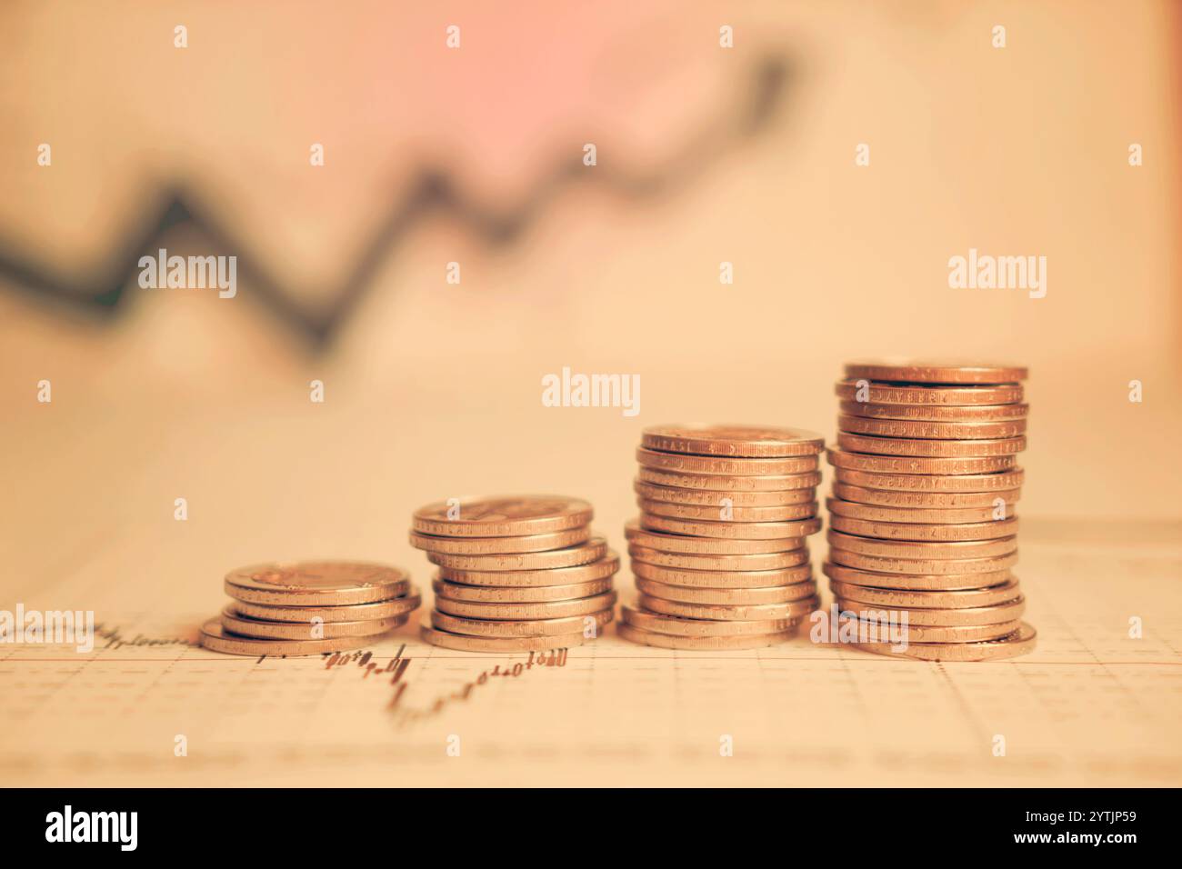 Business diagram on financial report with coins Stock Photo - Alamy