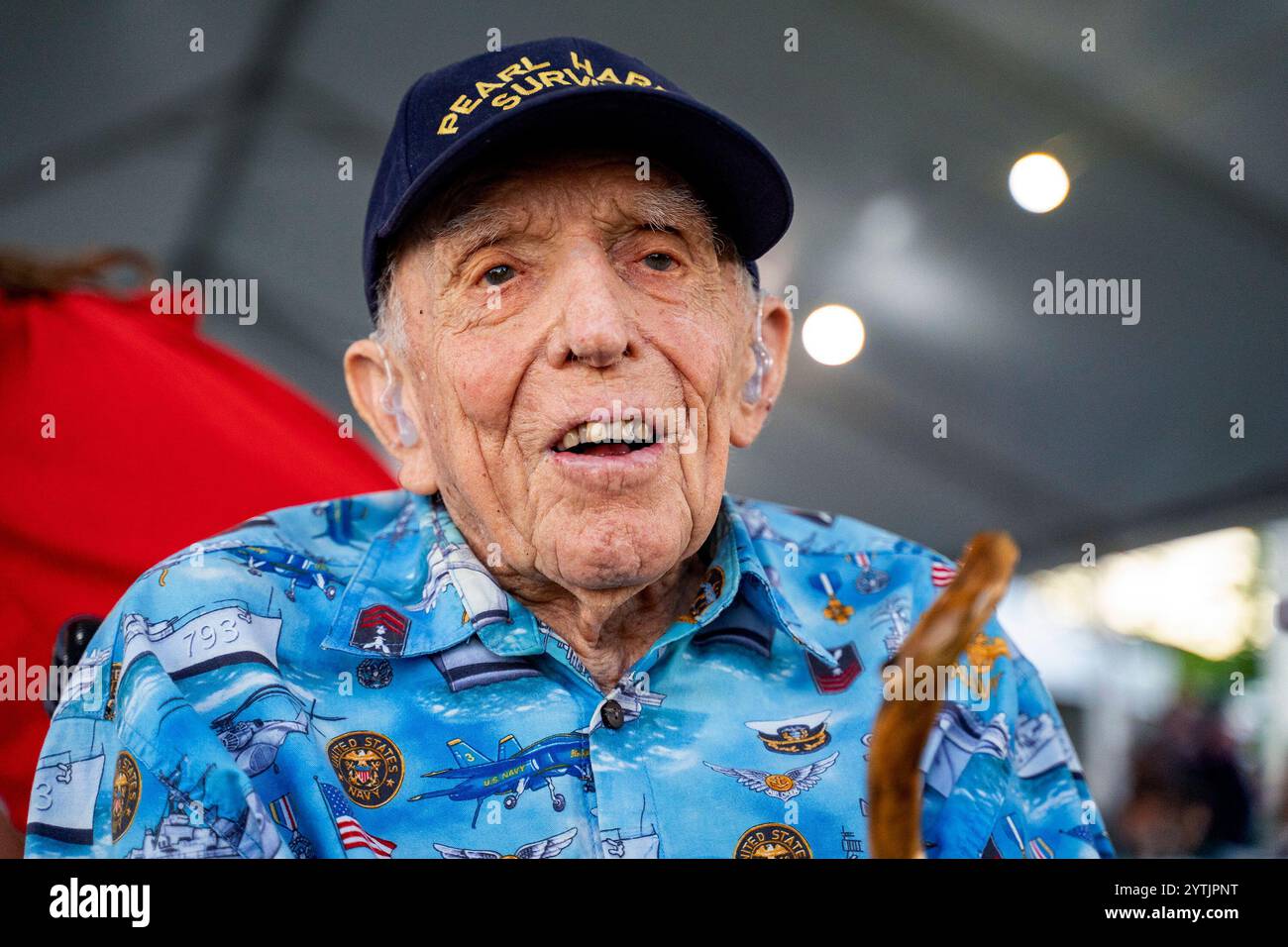Ken Stevens, 102, of Powers, Ore., who survived the attack on Pearl Harbor talks to the media ...