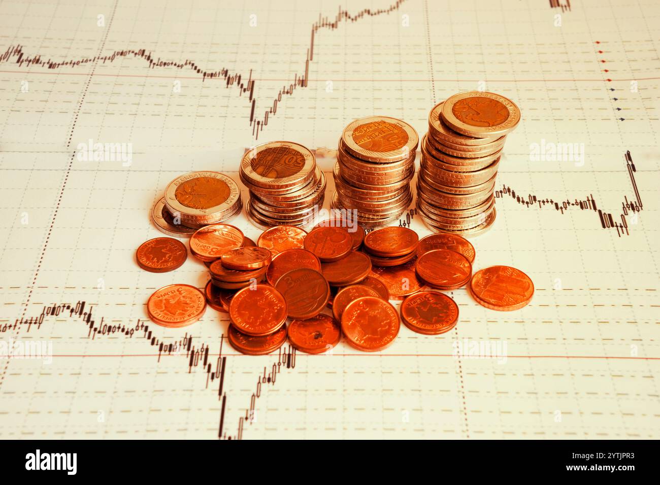 Business diagram on financial report , coins Stock Photo - Alamy