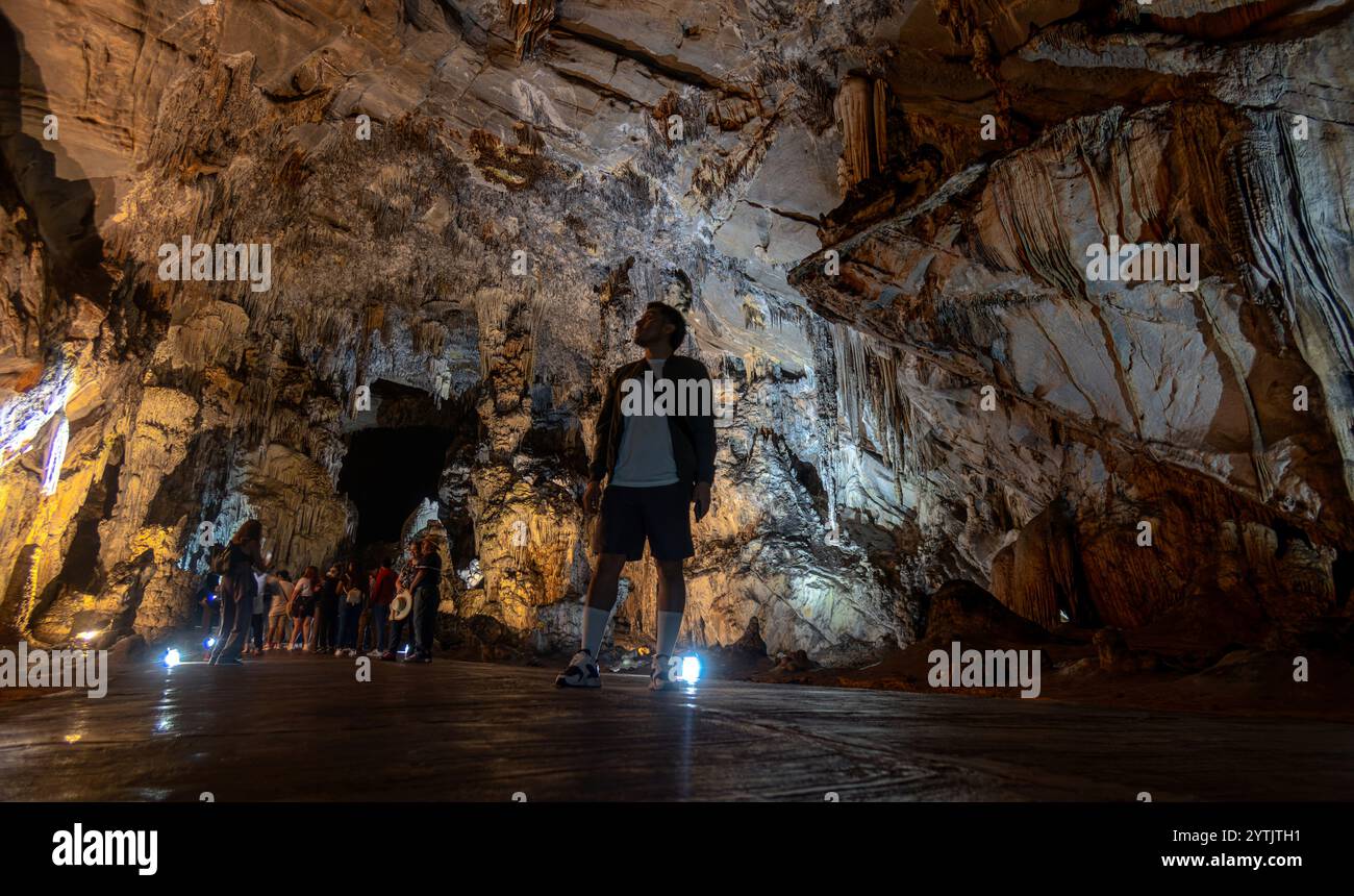 Visitors explore the breathtaking caves of Grutas de Cacahuamilpa ...