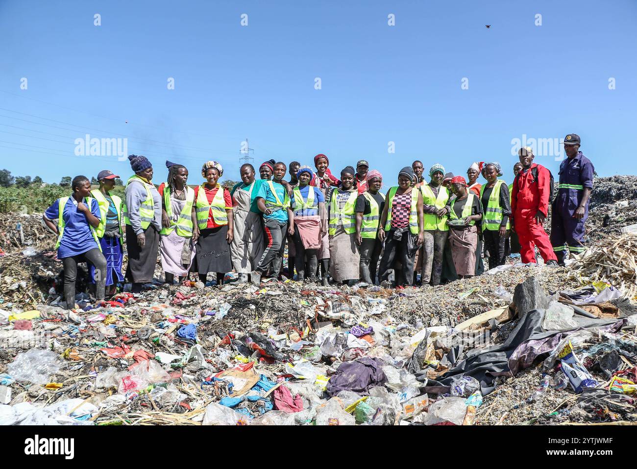 Members of Nakuru County Waste Pickers Association (NACOWAPIA) pose for ...