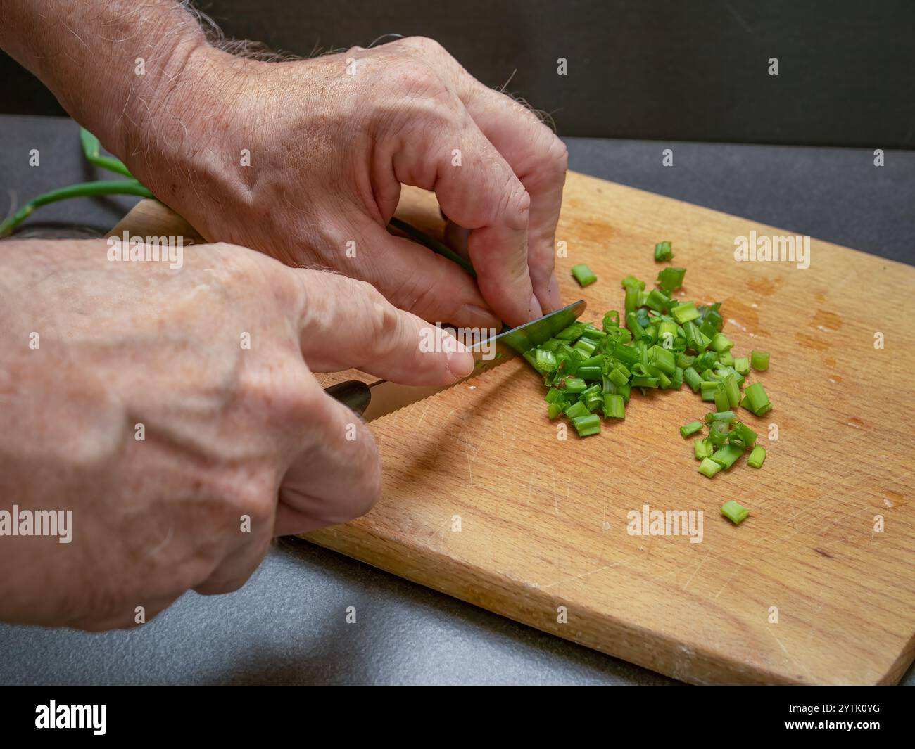 Chef hands cutting onion on hi-res stock photography and images - Alamy
