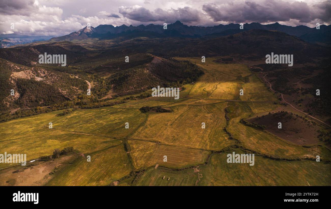 SEPTEMBER, 2024, RIDGWAY, COLORADO farm fields from above overlooking ...