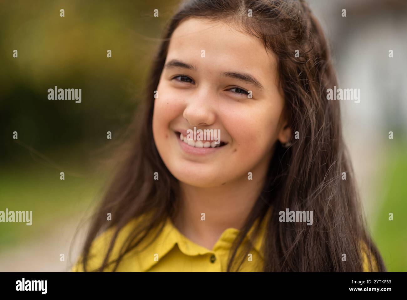 Close up portrait of a happy teenage girl with dimples on her cheeks ...