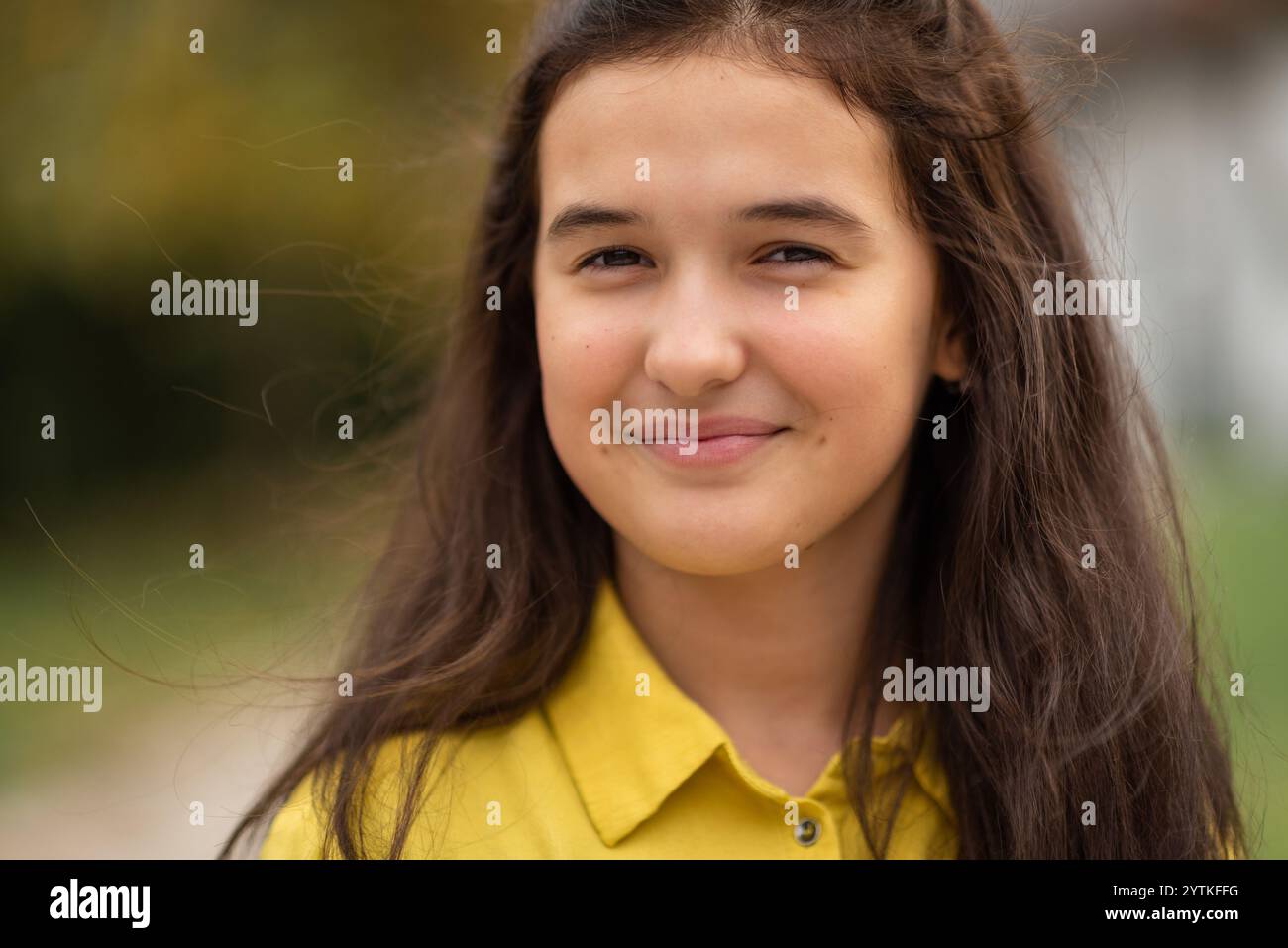 Close up portrait of a happy charming teenage girl with dimples on her ...