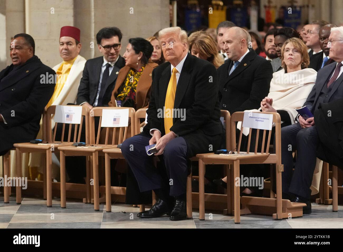 President-elect Donald Trump sits in Notre Dame Cathedral as France's ...
