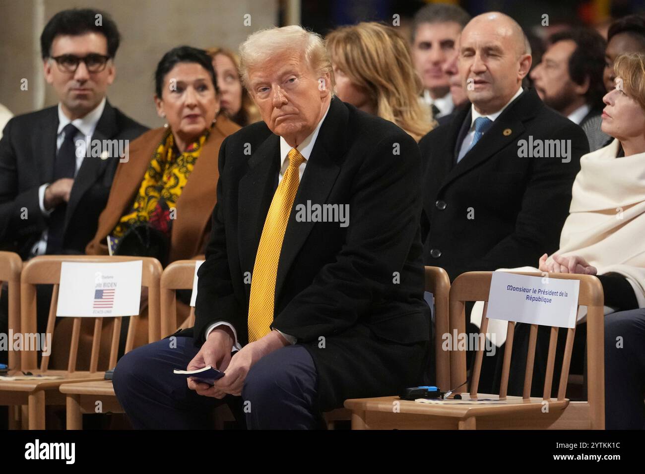 President-elect Donald Trump sits in Notre Dame Cathedral as France's ...