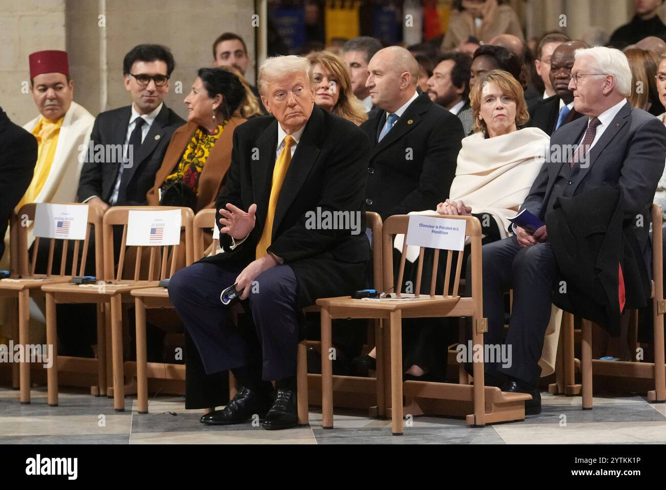 President-elect Donald Trump sits in Notre Dame Cathedral as France's ...