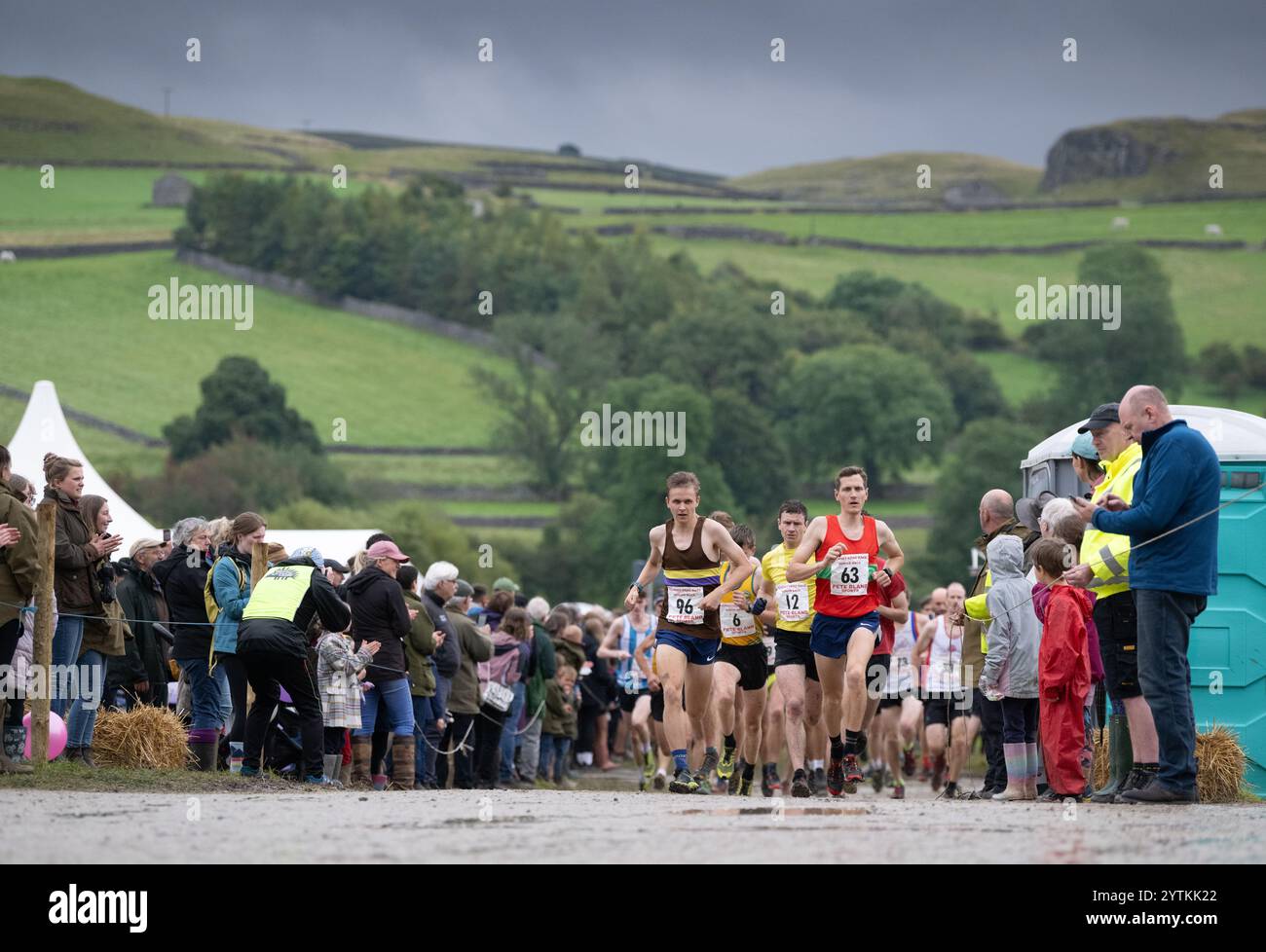Runners on the Kilnsey Crag fell race held at the Kilnsey Show in the ...