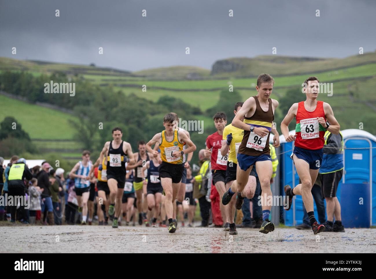 Runners on the Kilnsey Crag fell race held at the Kilnsey Show in the ...