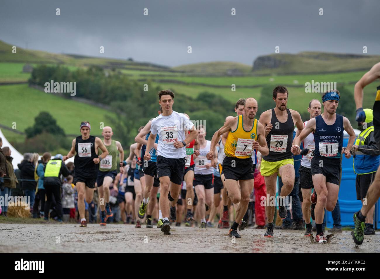 Runners on the Kilnsey Crag fell race held at the Kilnsey Show in the ...