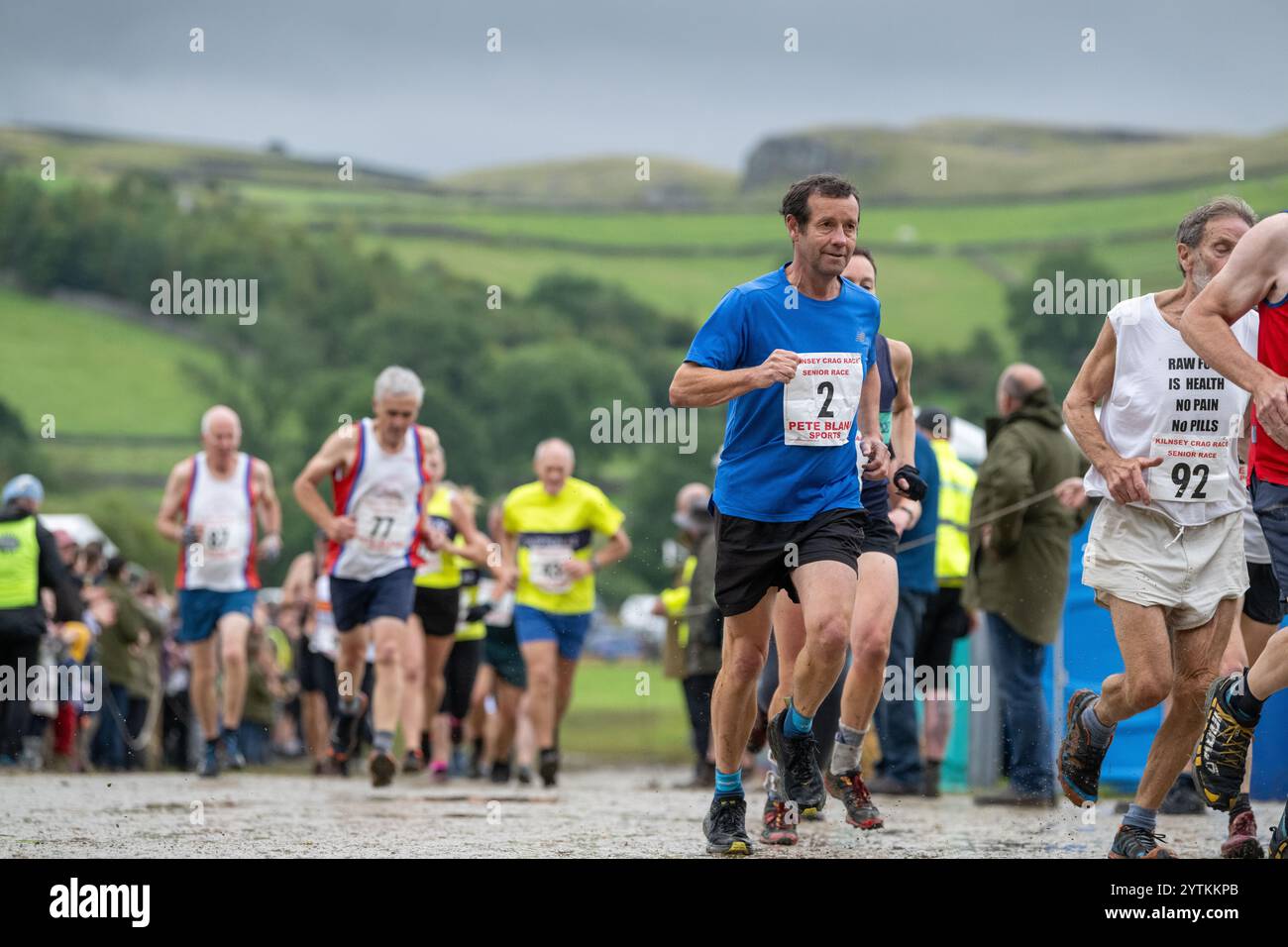 Runners on the Kilnsey Crag fell race held at the Kilnsey Show in the ...