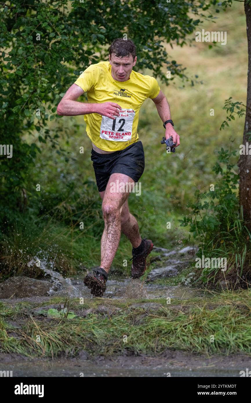 Runners on the Kilnsey Crag fell race held at the Kilnsey Show in the ...