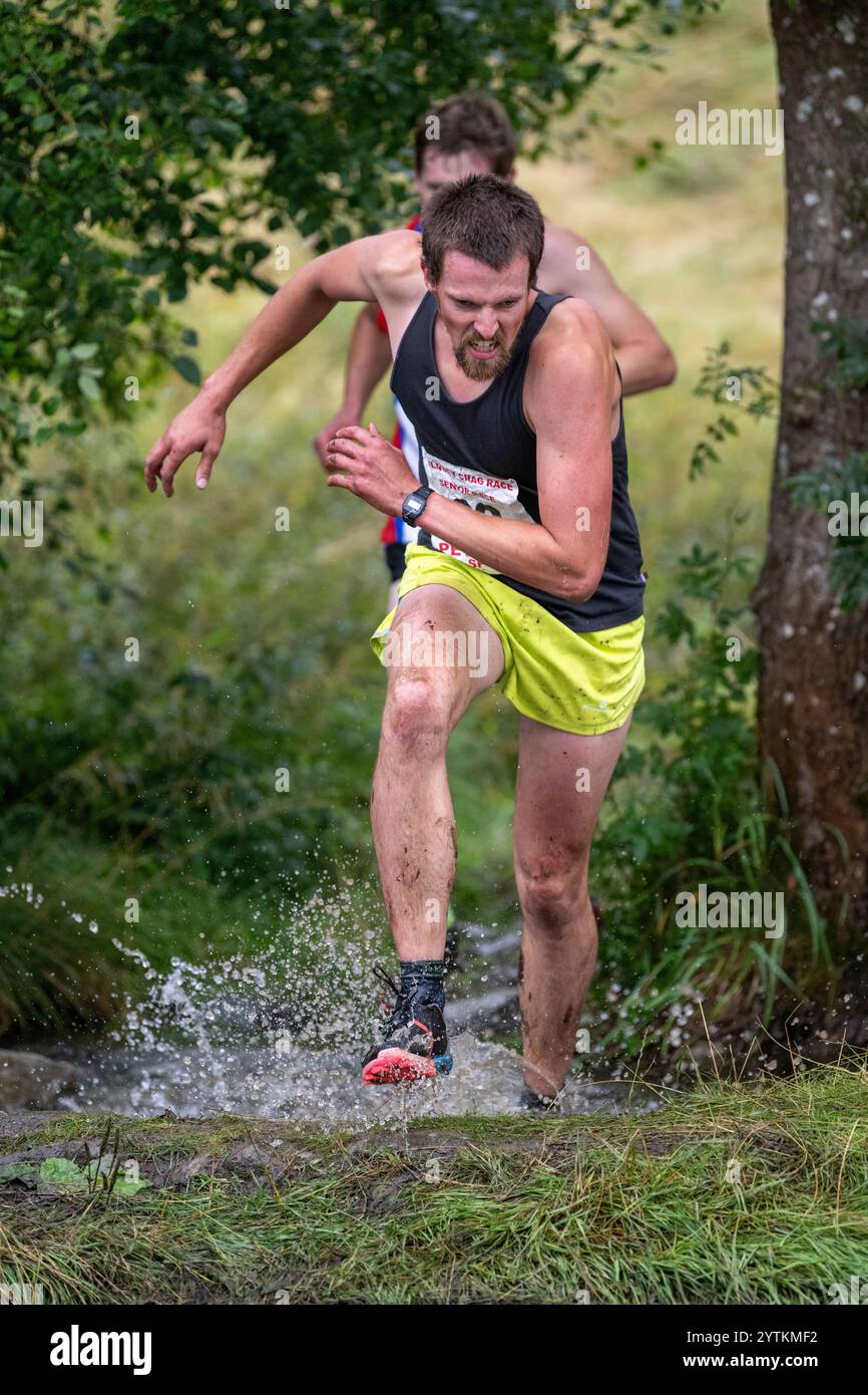 Runners on the Kilnsey Crag fell race held at the Kilnsey Show in the ...