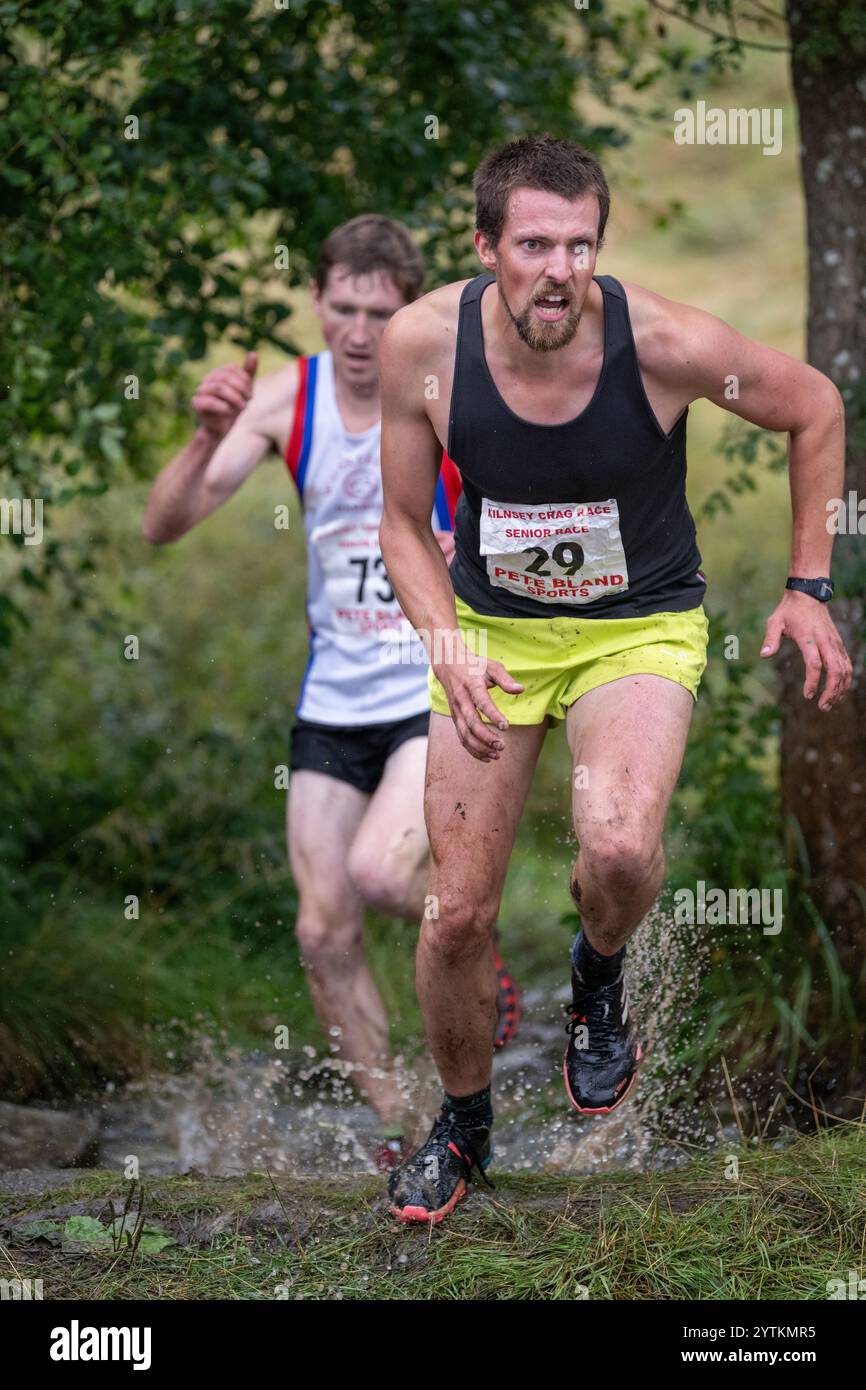 Runners on the Kilnsey Crag fell race held at the Kilnsey Show in the ...