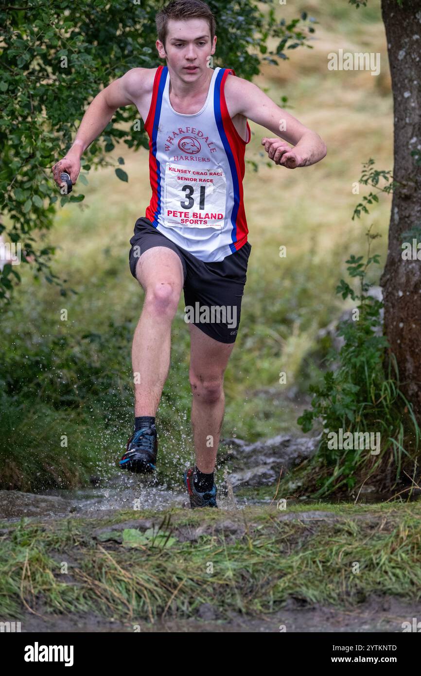 Runners on the Kilnsey Crag fell race held at the Kilnsey Show in the ...