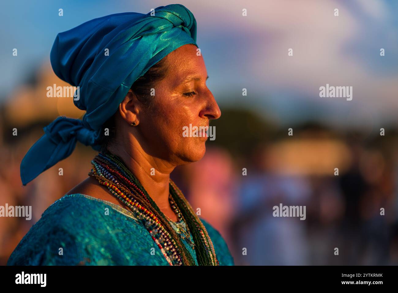 A worshiper of Umbanda, the Afro-Uruguayan religious cult, prays to the ...